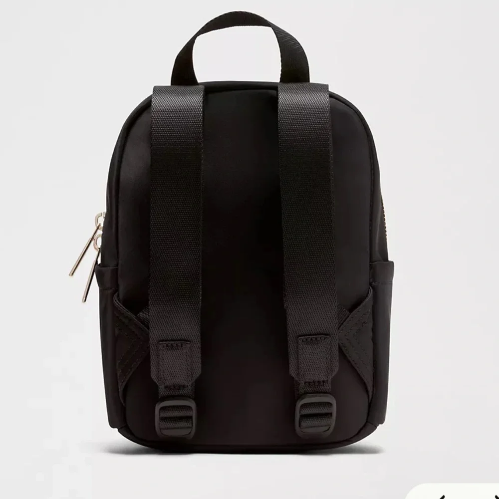 lululemon athletica | Bags | Lululemon Everywhere Backpack Mini 4lmetal ...